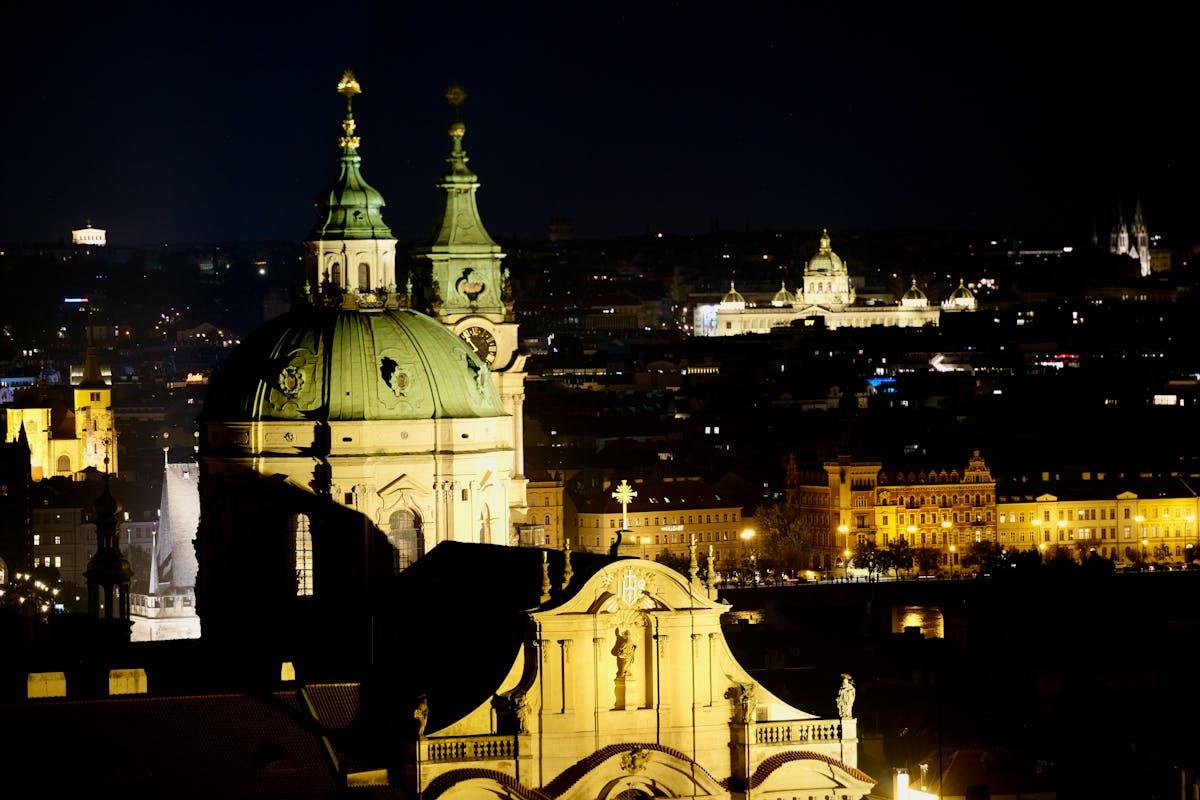 Prague historic buildings and towers illuminated at night