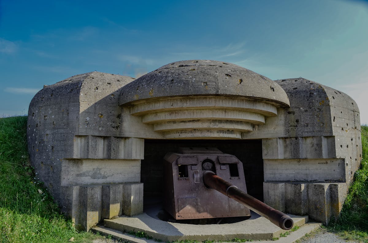 Concrete German World War II bunker fortification at a Normandy D-Day beach site