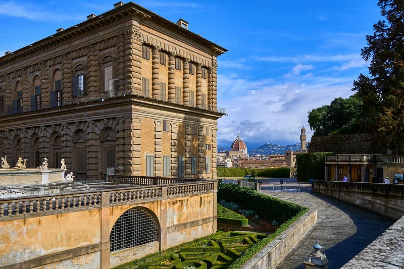 Aerial view of Palazzo Pitti with Florence Cathedral and city rooftops visible in the background