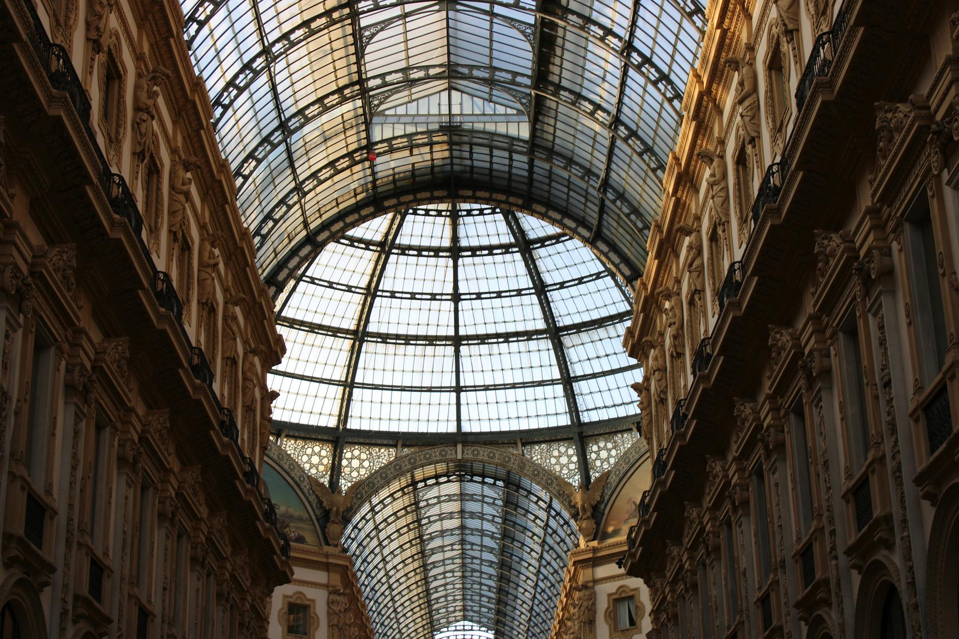 Ornate glass dome ceiling of Galleria Vittorio Emanuele II in Milan