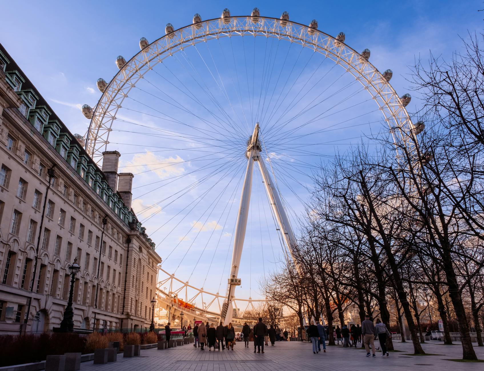 The London Eye with a backdrop of blue skies