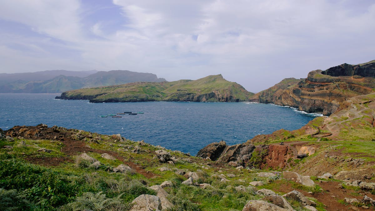 Coastal landscape of Madeira island with cliffs and blue ocean