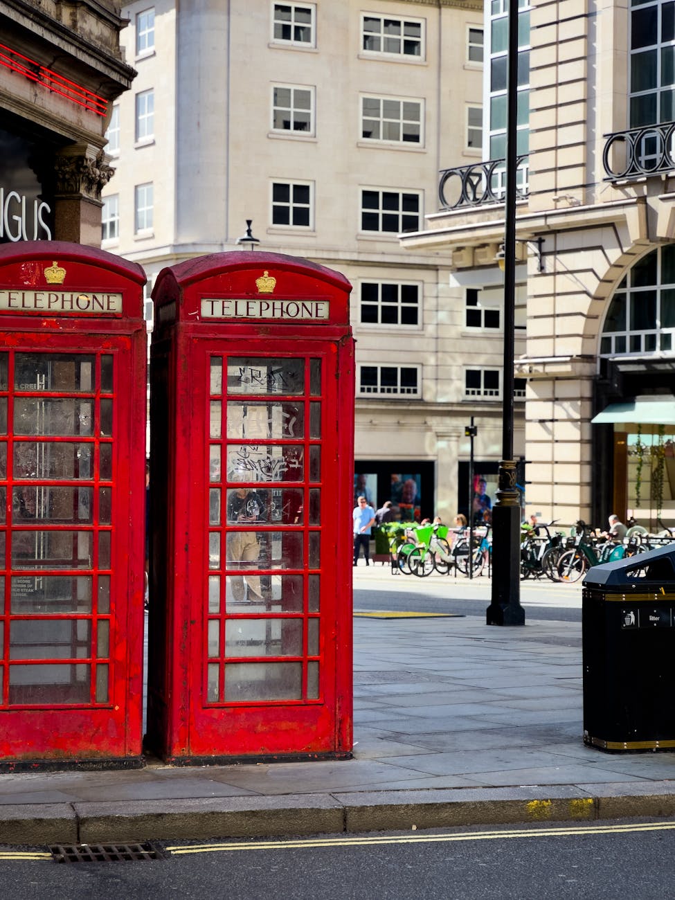 Classic red telephone booths on a London street