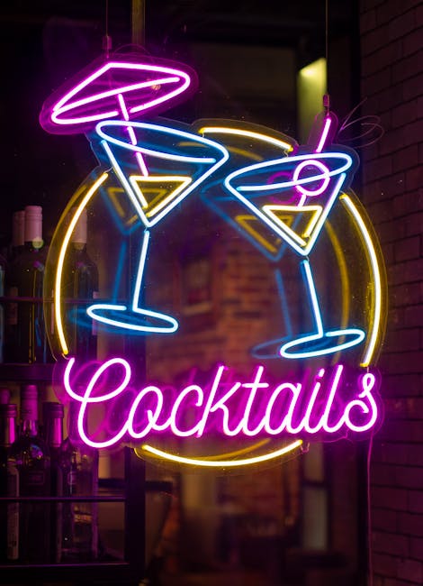 Colorful neon cocktail sign in a bar