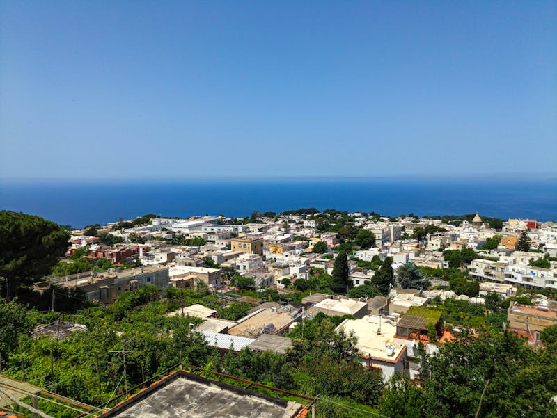 White buildings and blue sea in Capri Italy viewed from above