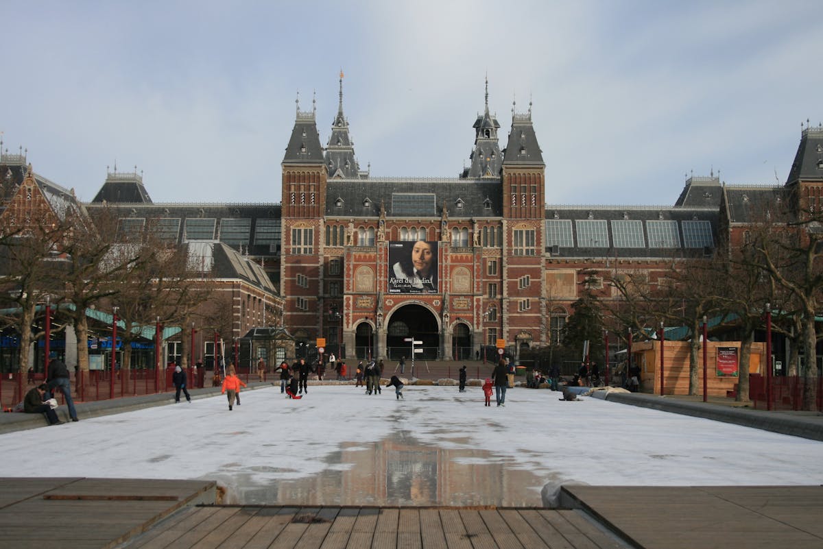 People skating in winter in front of the Rijksmuseum in Amsterdam
