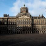 The Royal Palace on Dam Square in Amsterdam, a grand classical building that dominates the city center