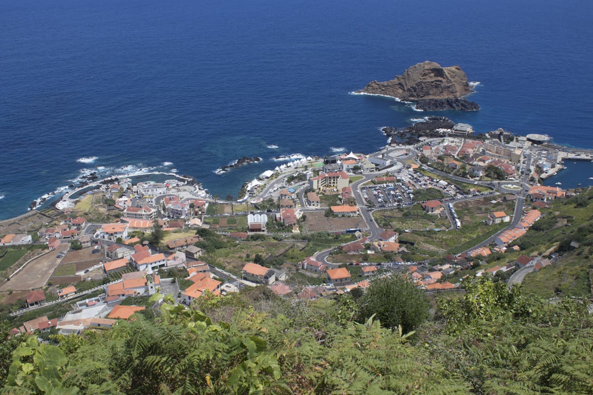 Aerial view of Porto Moniz coastal town and volcanic pools in Madeira