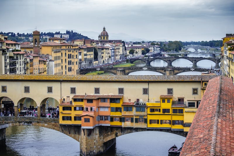 Ponte Vecchio bridge spanning the Arno River in Florence Italy