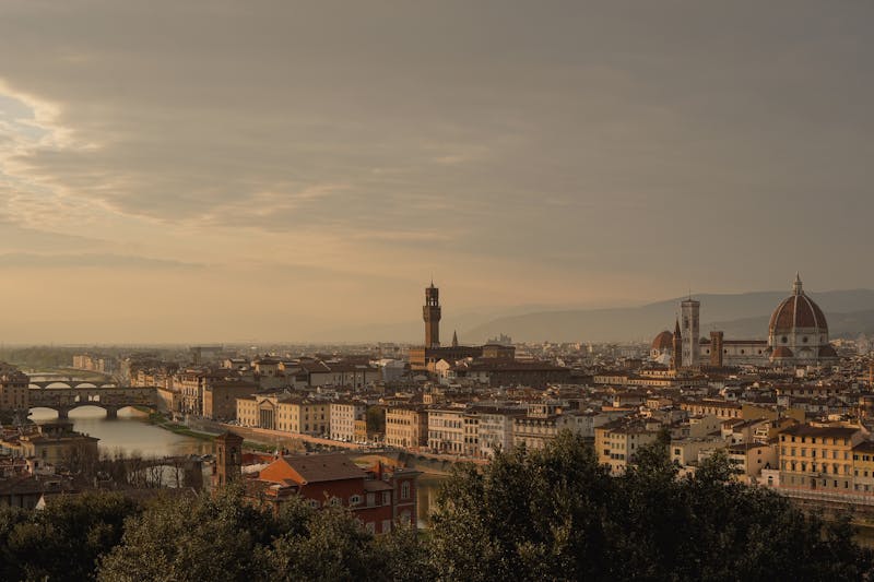 Florence cityscape at sunset featuring the Duomo cathedral dome