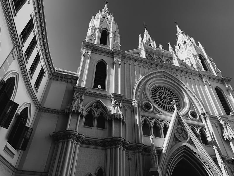 Black and white photograph of the Gothic facade of Malaga Cathedral