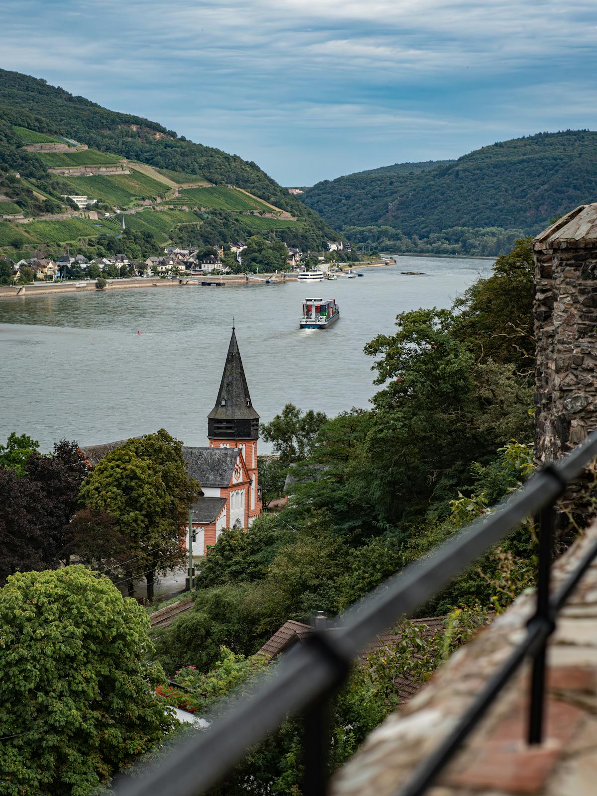 Trechtingshausen village along the Rhine River with hills and church
