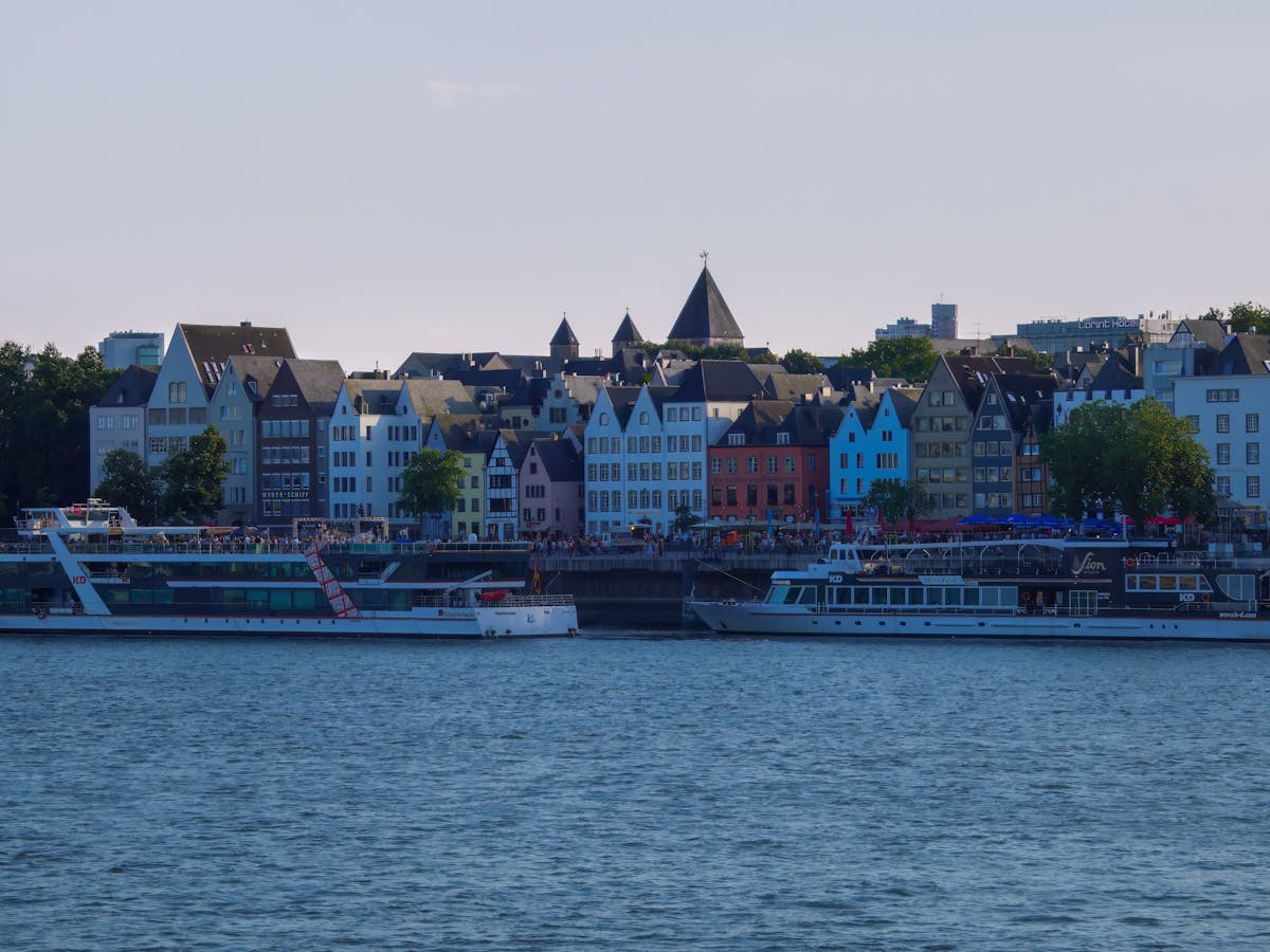 Colorful buildings and boats along a Rhine River waterfront