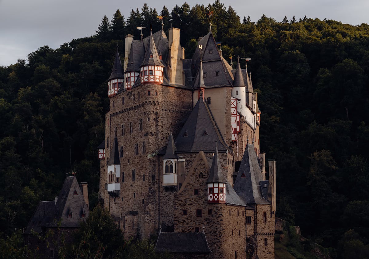 Medieval Burg Eltz castle surrounded by dense forest in Germany