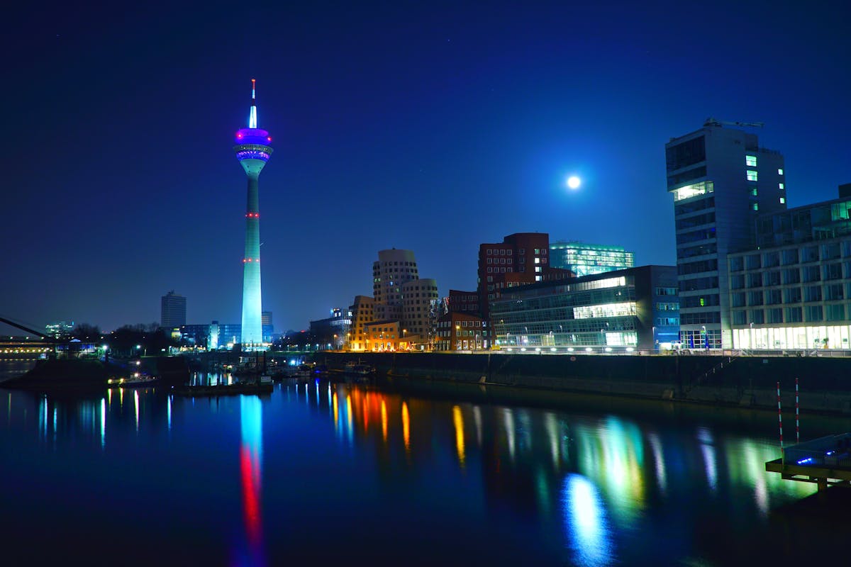 Dusseldorf Rhine River skyline illuminated at night