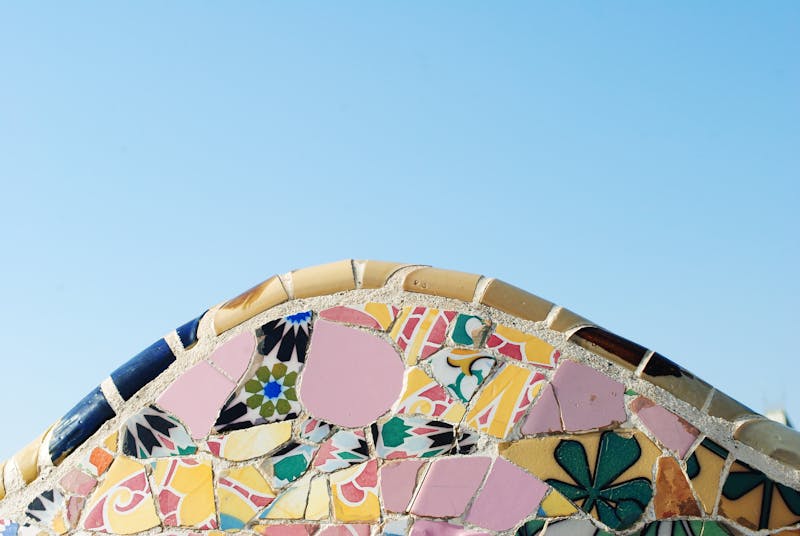 Detailed view of Gaudi mosaic tile work at Park Guell in Barcelona