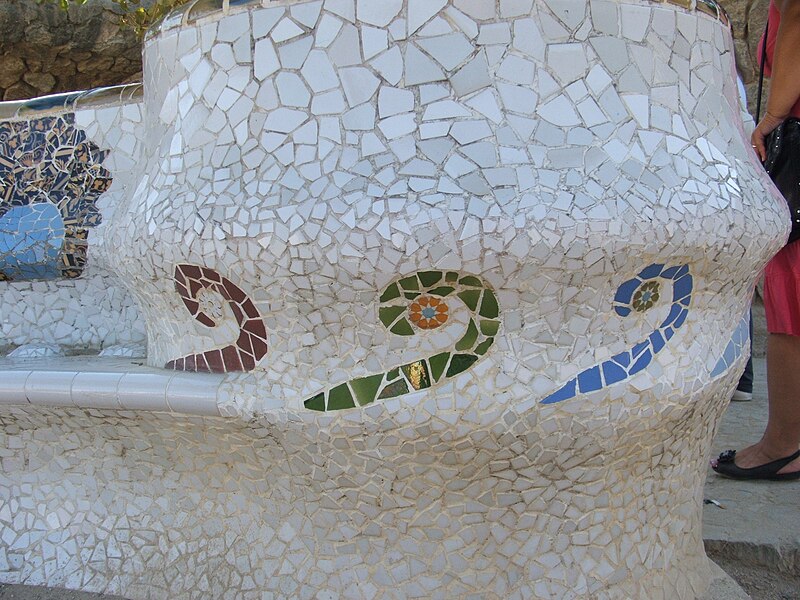 Colorful mosaic tiles on the serpentine bench at Park Guell