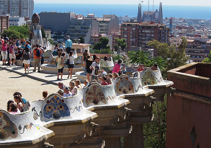 Panoramic view from Park Guell looking over Barcelona with Sagrada Familia visible in the distance