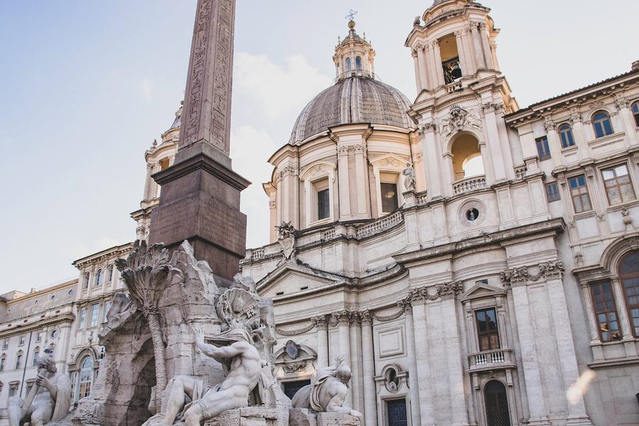 Piazza Navona with the Fountain of the Four Rivers and Sant Agnese church in Rome Italy