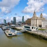 Aerial view of Liverpool iconic Three Graces buildings at Pier Head waterfront