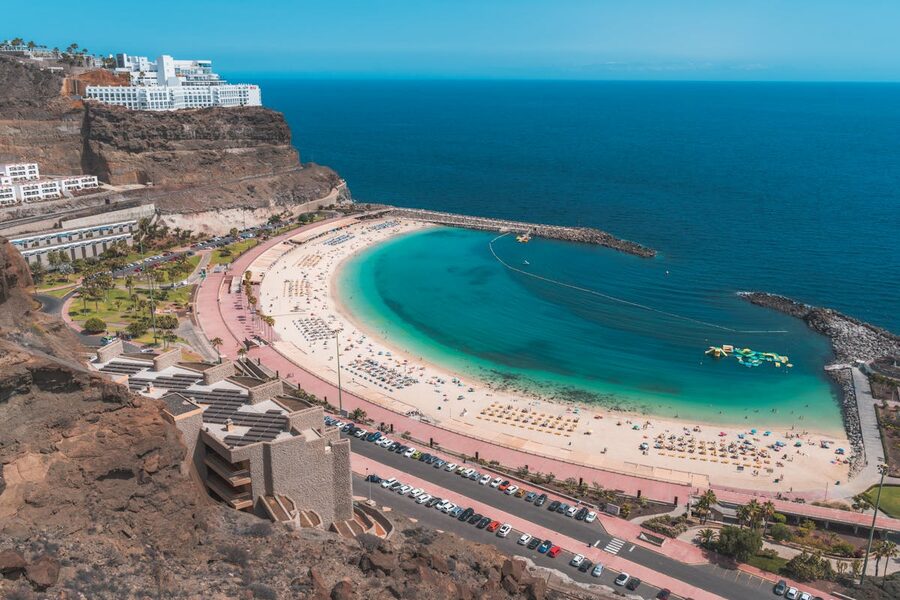 Stunning aerial view of Playa de Amadores beach with turquoise water in Gran Canaria