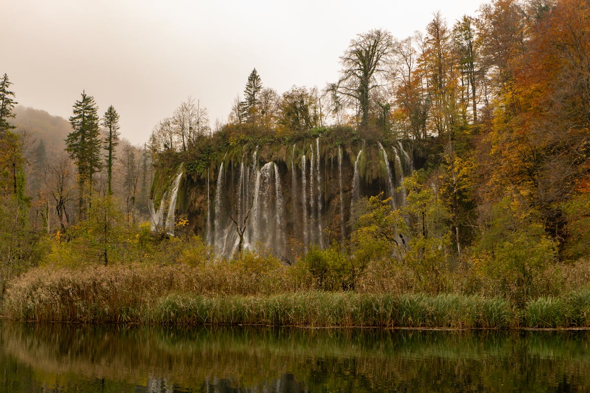 Waterfall with colorful autumn foliage at Plitvice Lakes National Park