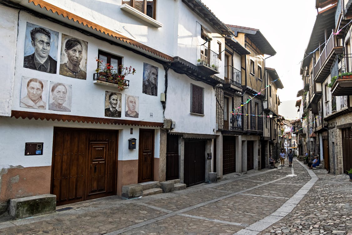 Rustic stone and timber buildings in a picturesque Spanish village