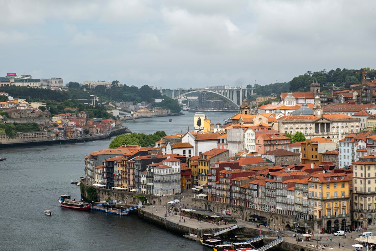 Aerial view of Porto colorful riverside architecture and historic landmarks from above