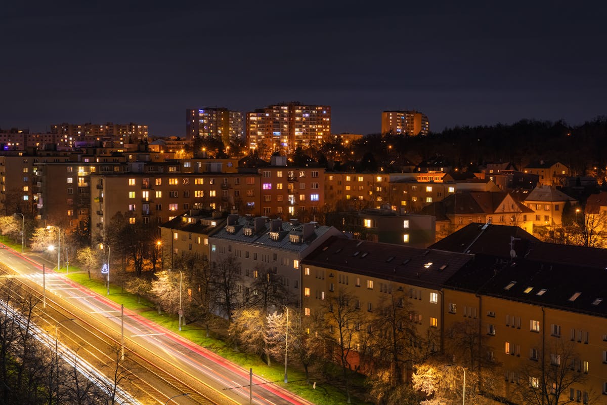 Prague night cityscape with light trails from traffic and illuminated buildings