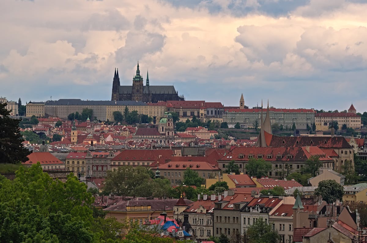 Breathtaking view of Prague historic architecture under a dramatic sky