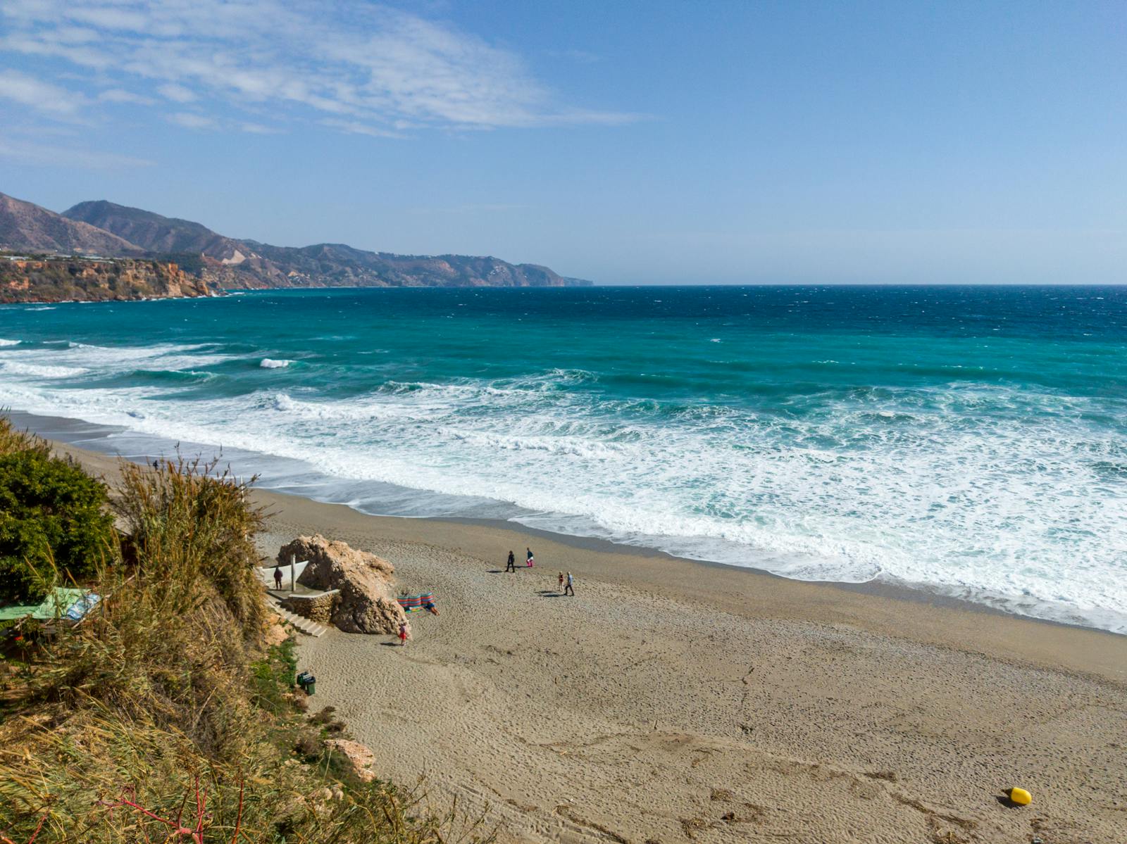 Aerial view of Nerja beach with turquoise Mediterranean water
