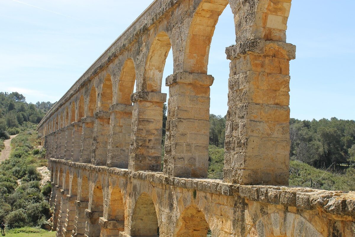 Ancient Roman aqueduct stone arches in Spain near Valencia region