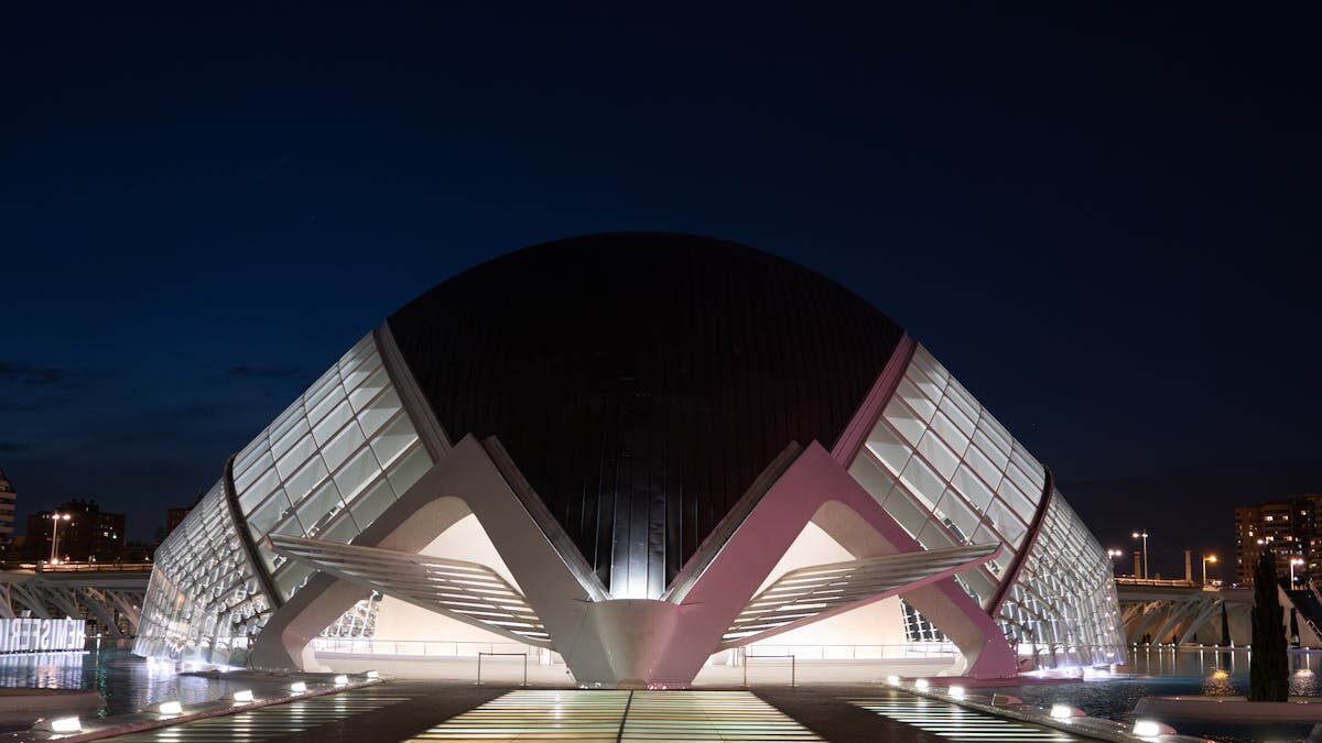 City of Arts and Sciences Valencia illuminated at night with blue reflections