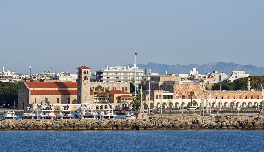 Yachts and medieval architecture at Mandraki Harbor