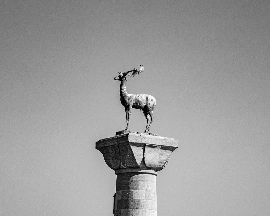 Deer sculpture on a column in Rhodes harbor