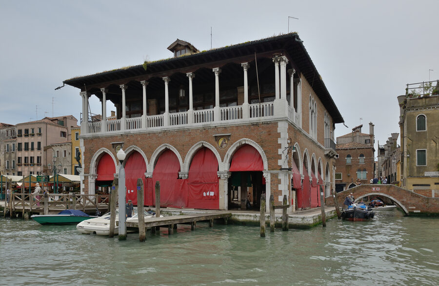 The historic Rialto fish market building in Venice with its Gothic arches