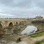 The Roman Bridge of Cordoba spanning the Guadalquivir River with the old town behind