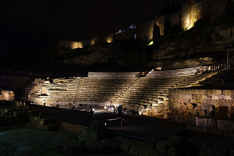 Roman Theatre and Alcazaba illuminated at night in Malaga