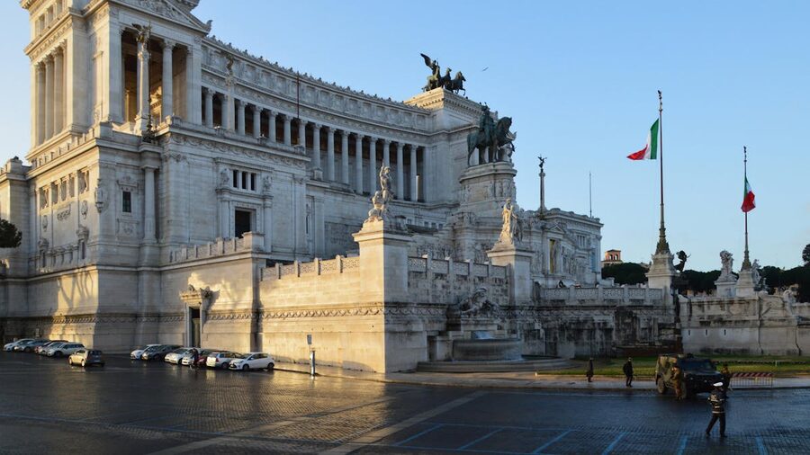 The Altare della Patria monument in Rome with Italian flags waving