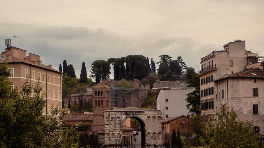The ancient Arch of Janus amidst the architecture of Rome