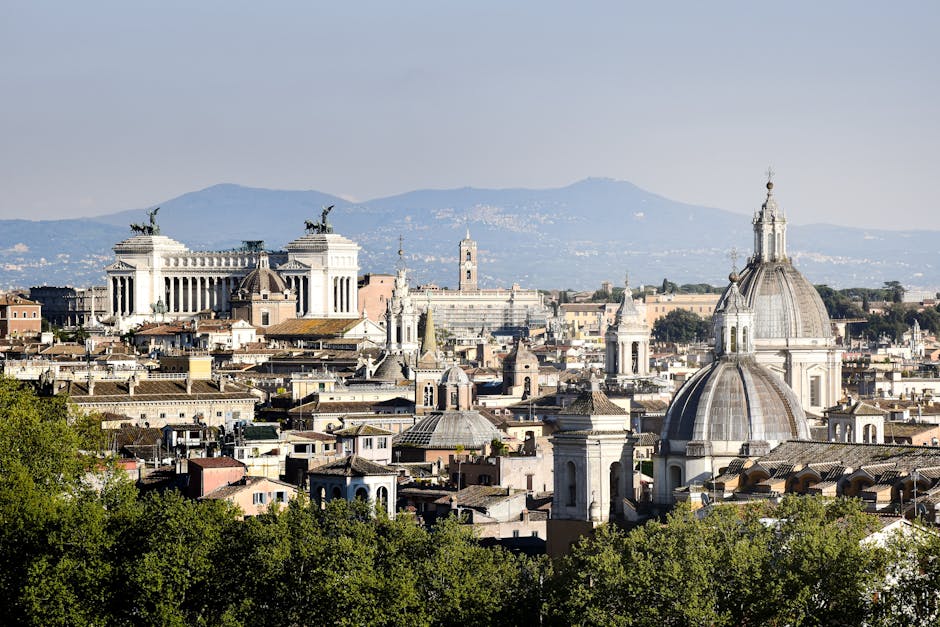 Panoramic view of Rome showing historic domes and classical architecture