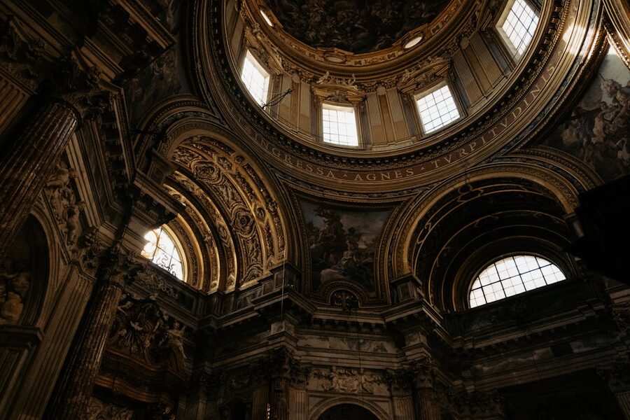 Looking up at the intricately decorated dome of Sant Agnese in Agone church in Rome