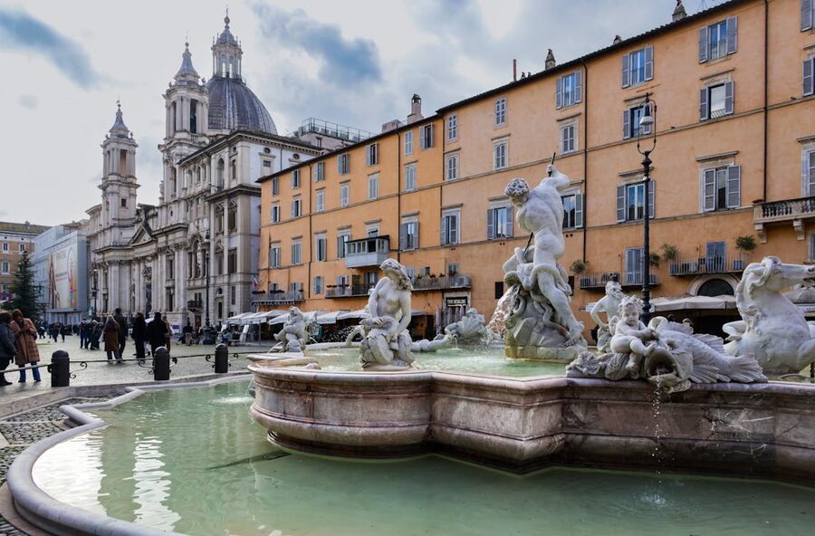 The Fountain of Neptune with Sant Agnese in Agone church in the background at Piazza Navona in Rome