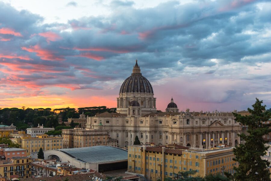 St Peters Basilica at sunset with dramatic clouds in Vatican City Rome