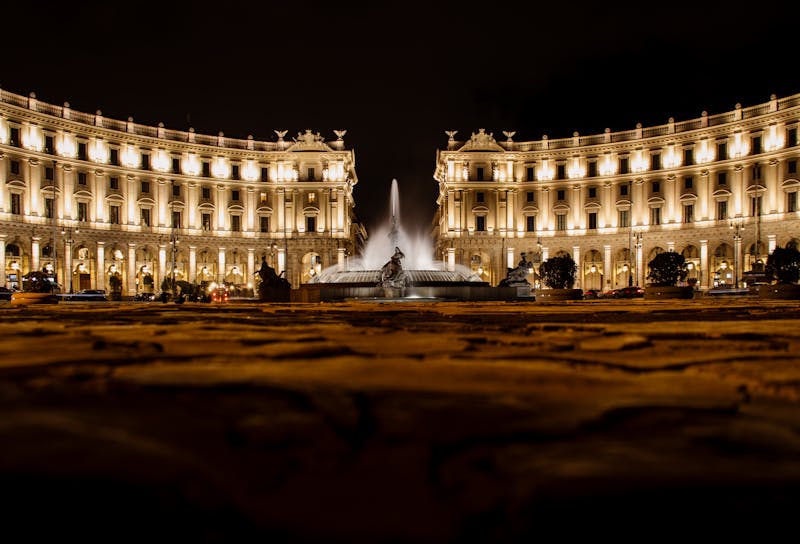 Illuminated night view of Piazza della Repubblica fountain in Rome