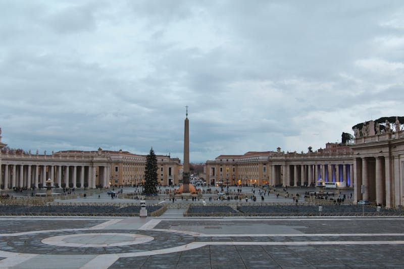 Wide view of St Peters Square in Vatican City with obelisk
