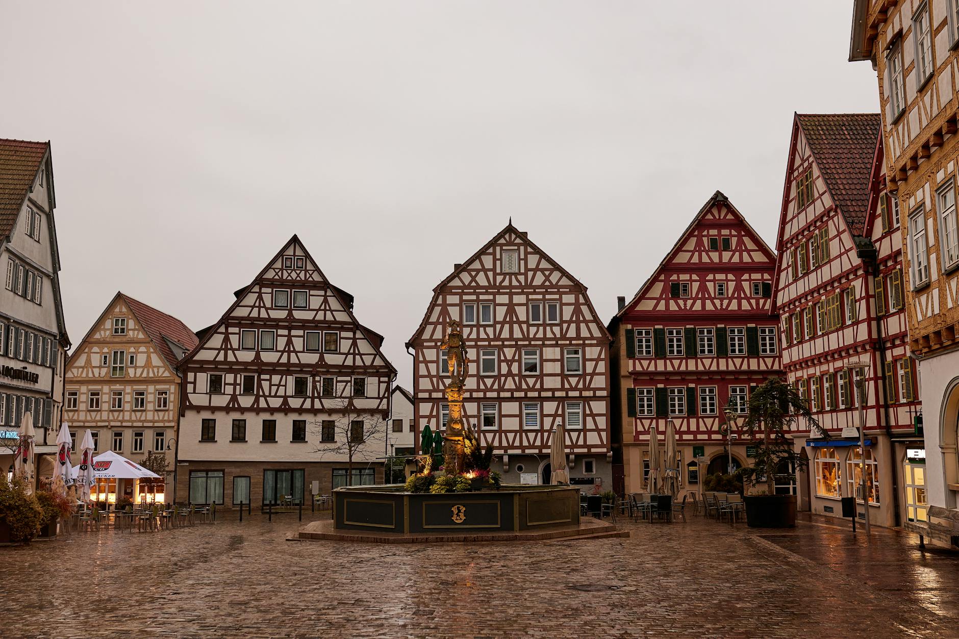 Old town square with traditional half-timbered houses in Germany