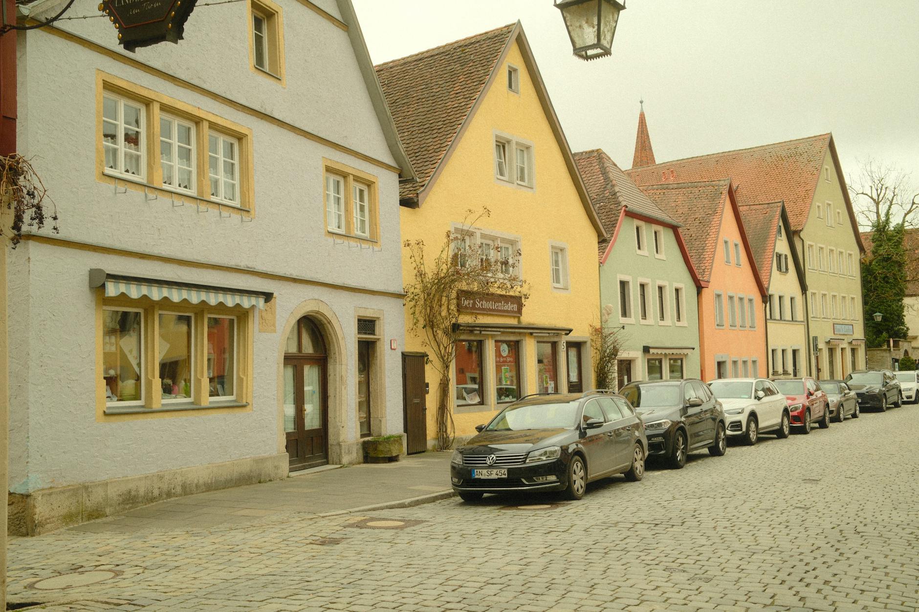 Colorful traditional houses on a cobblestone street in Rothenburg ob der Tauber