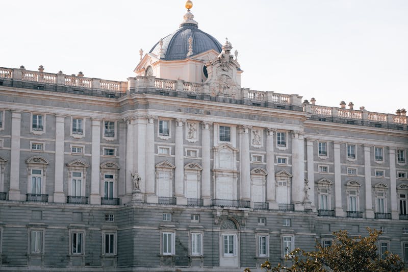 Close-up view of the Royal Palace of Madrid facade showing ornate Baroque architecture