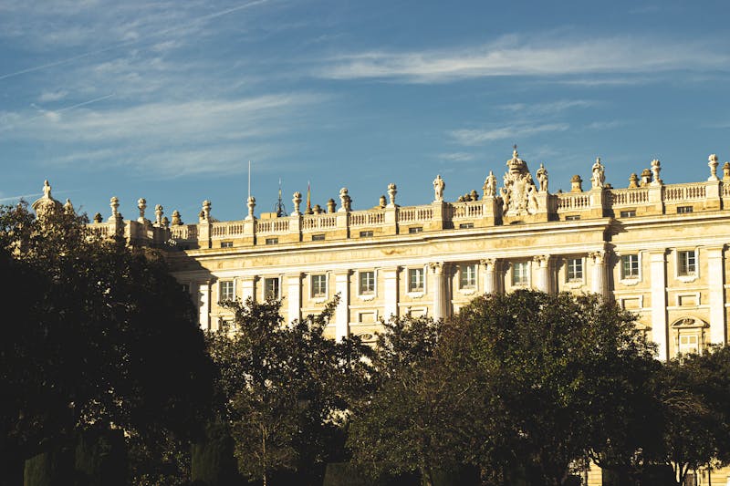 The Royal Palace of Madrid seen from the Plaza de Oriente on a sunny day